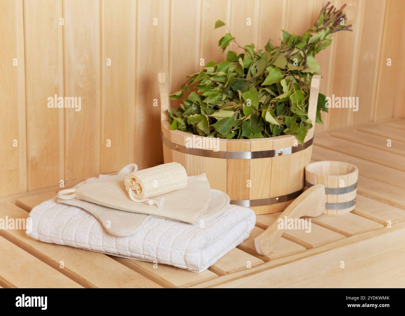 Traditional sauna stuff - birch besom and a bucket with accessories ...
