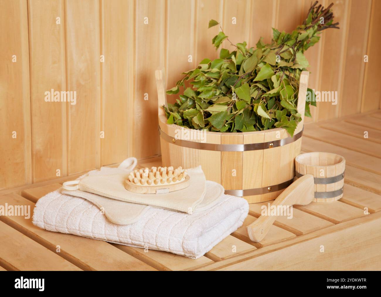 Sauna stuff - birch besom and a bucket with accessories Stock Photo - Alamy