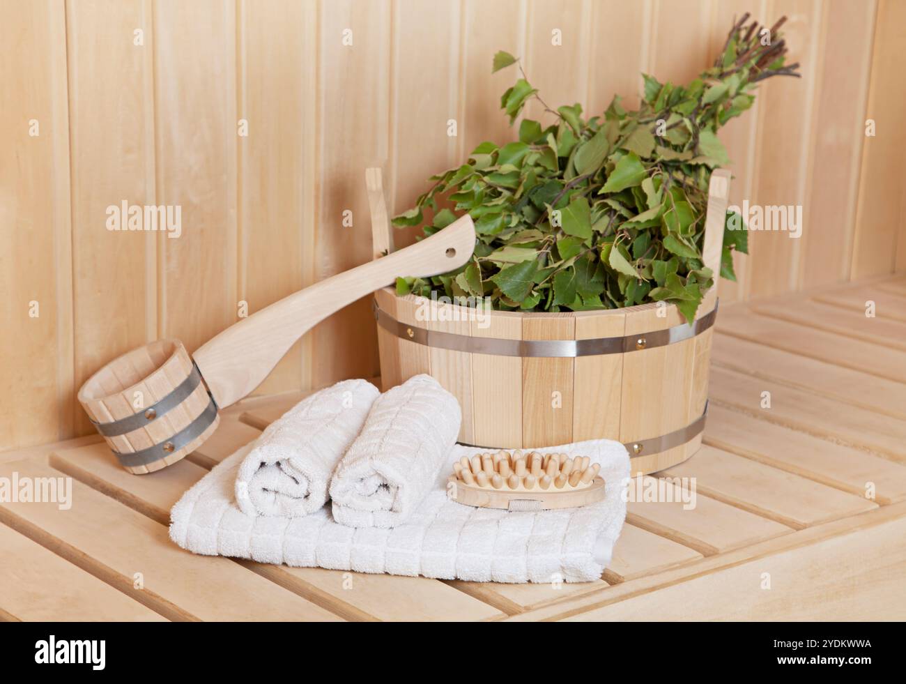 Sauna stuff - birch besom and a bucket with accessories Stock Photo - Alamy