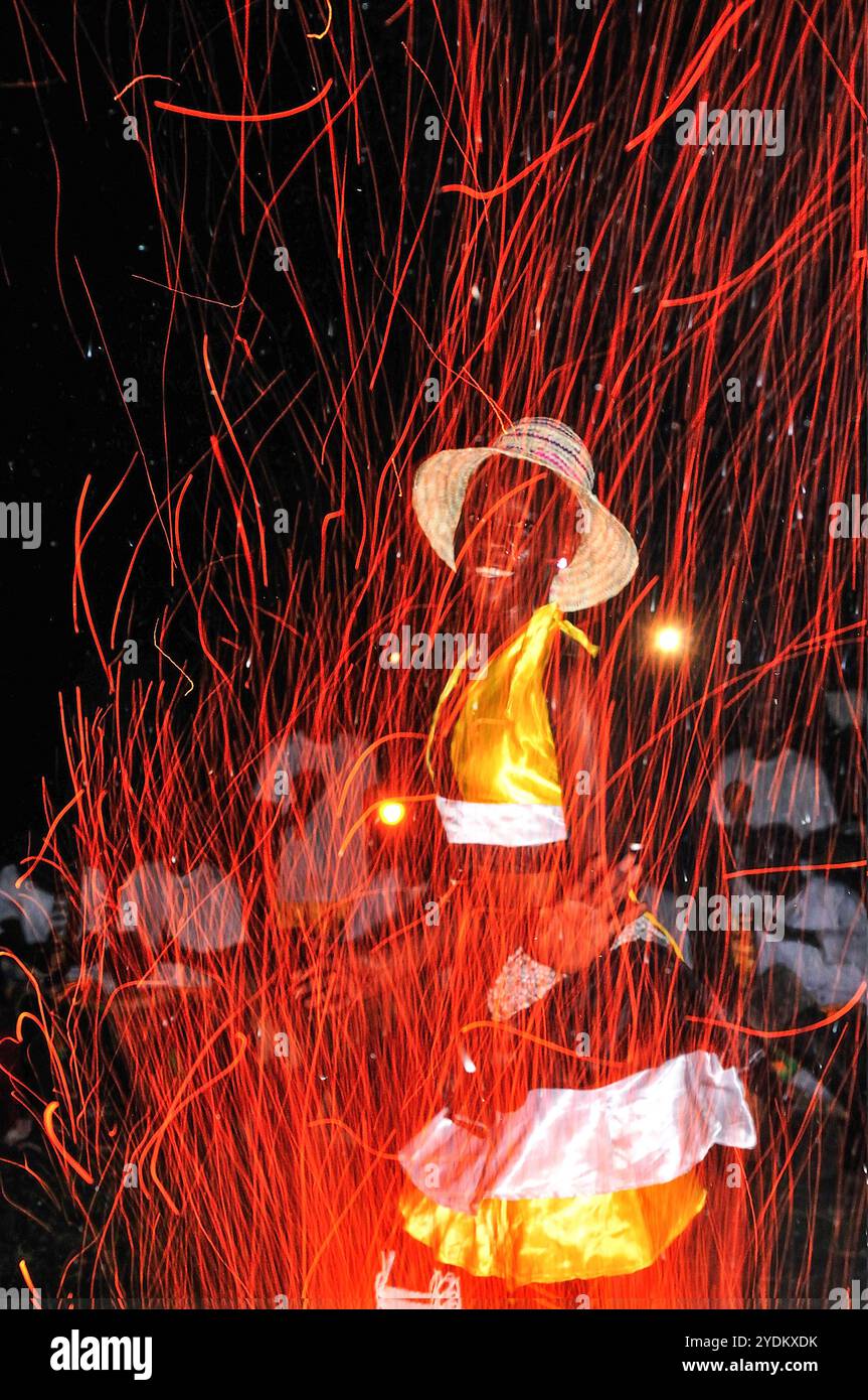 Traditional performers entertain guests at a campfire at Chobe Safari ...