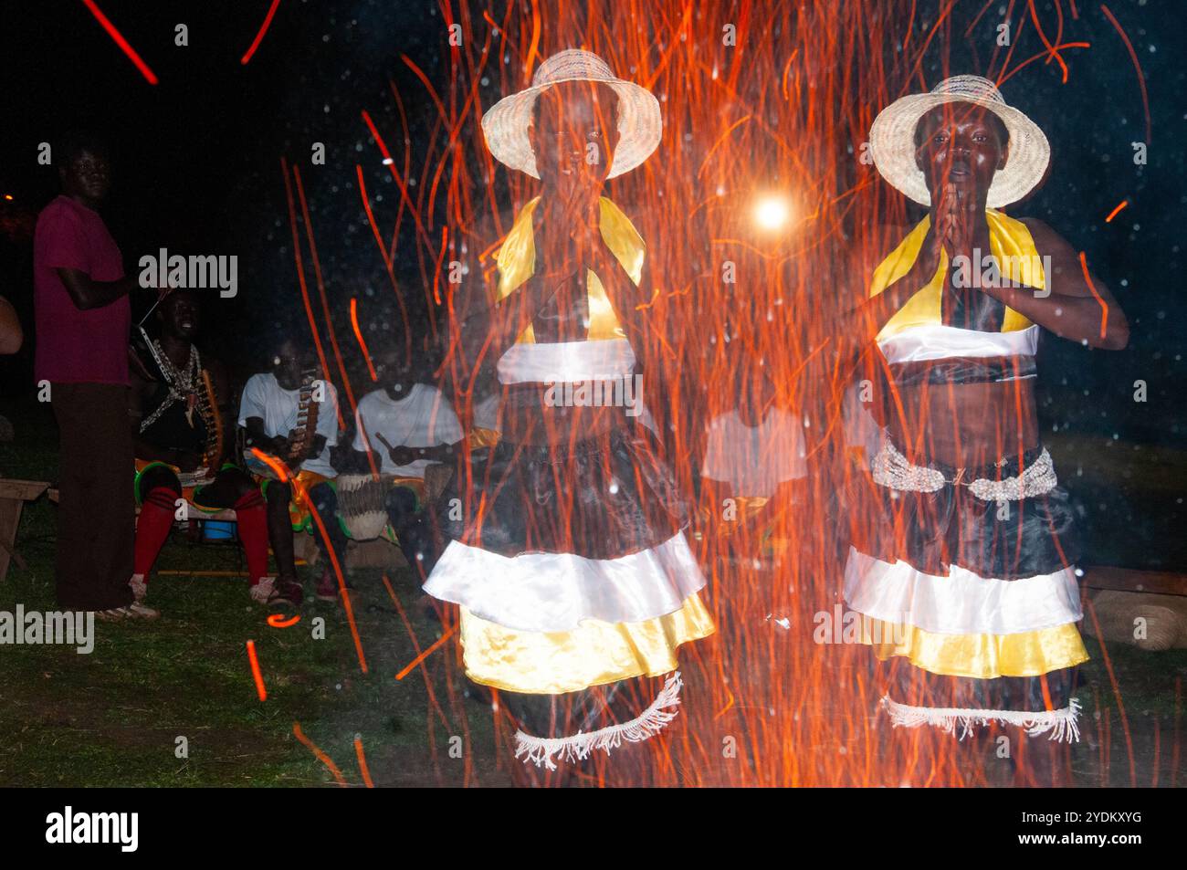 Traditional performers entertain guests at a campfire at Chobe Safari ...