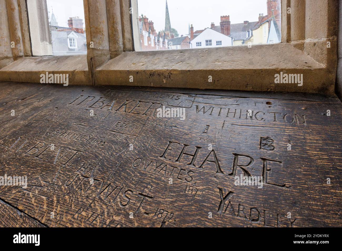 Historic graffiti carved into bench seats in the library, Shrewsbury ...