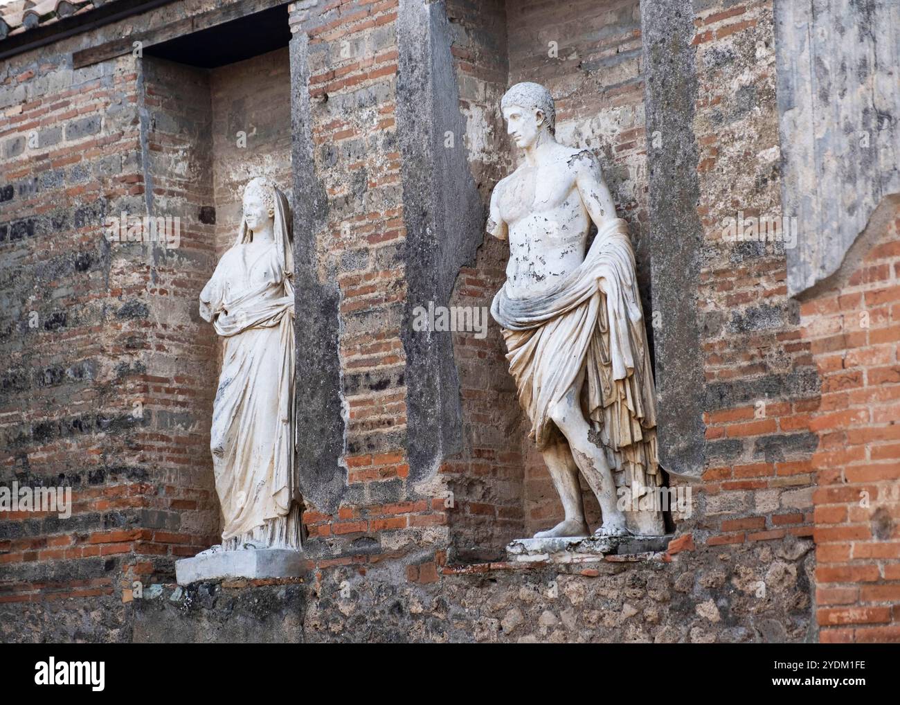Two white marble statues in the Macellum (marketplace) in the ruins of ...