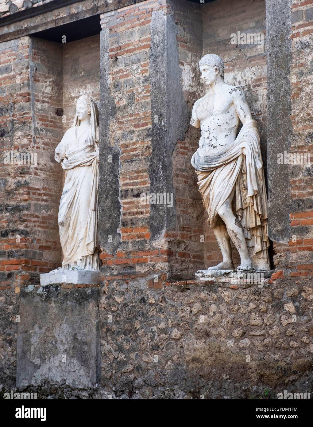 Two white marble statues in the Macellum (marketplace) in the ruins of ...