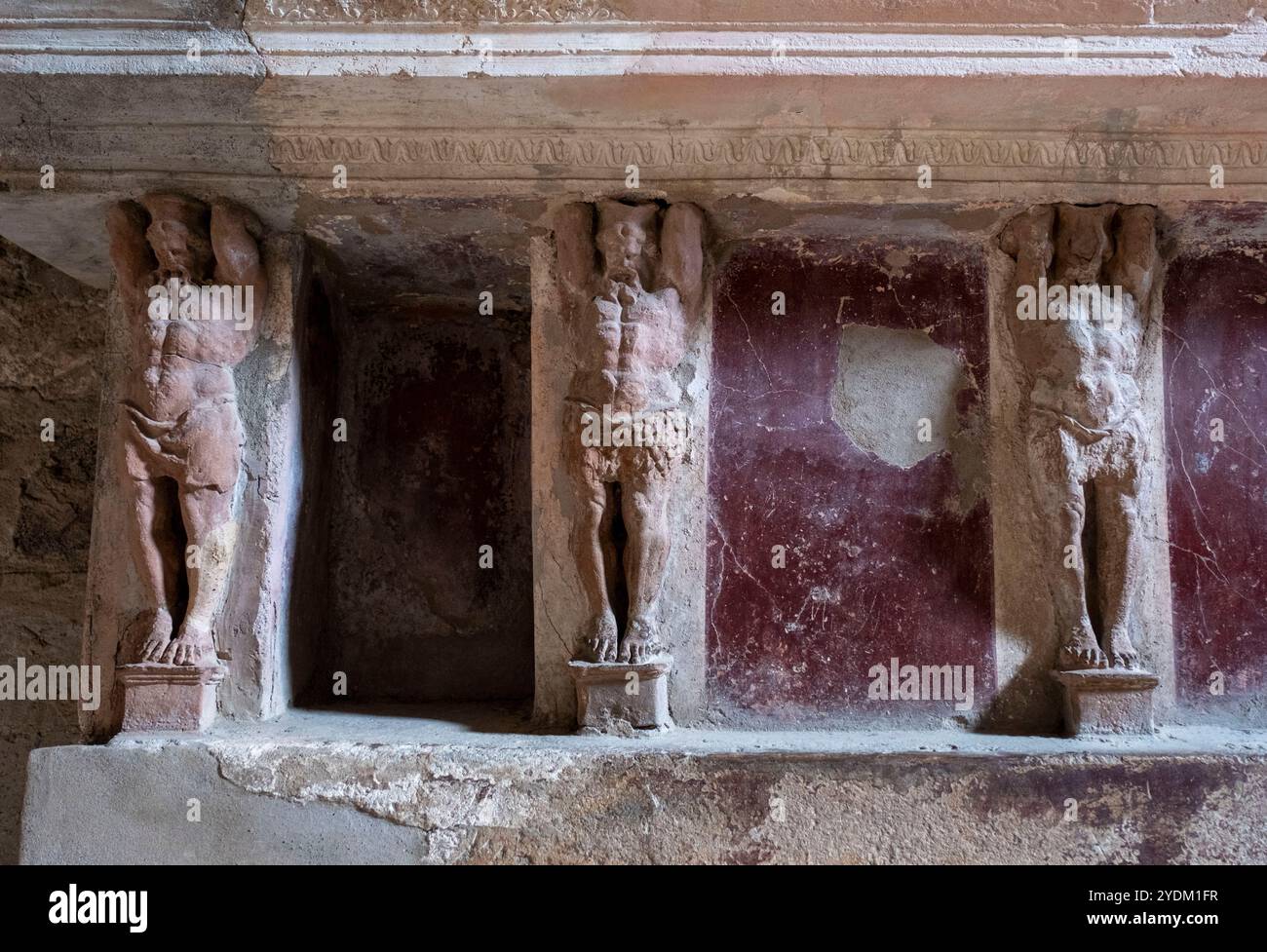 Miniature statues decorate the walls inside a Pompeii Bath House ...