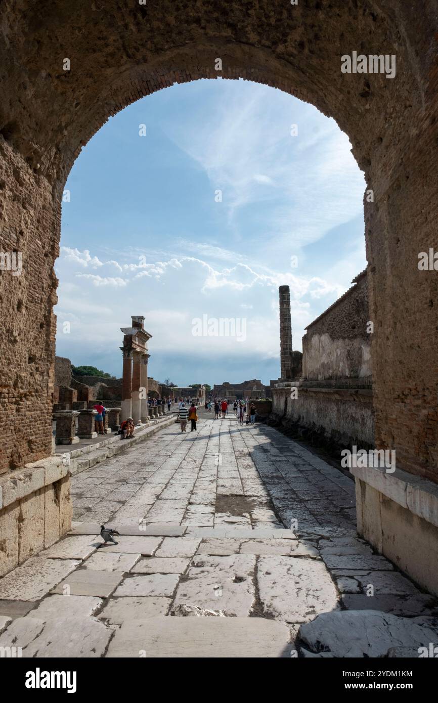 Paved street leading to the main square, Pompeii Archaeological park ...