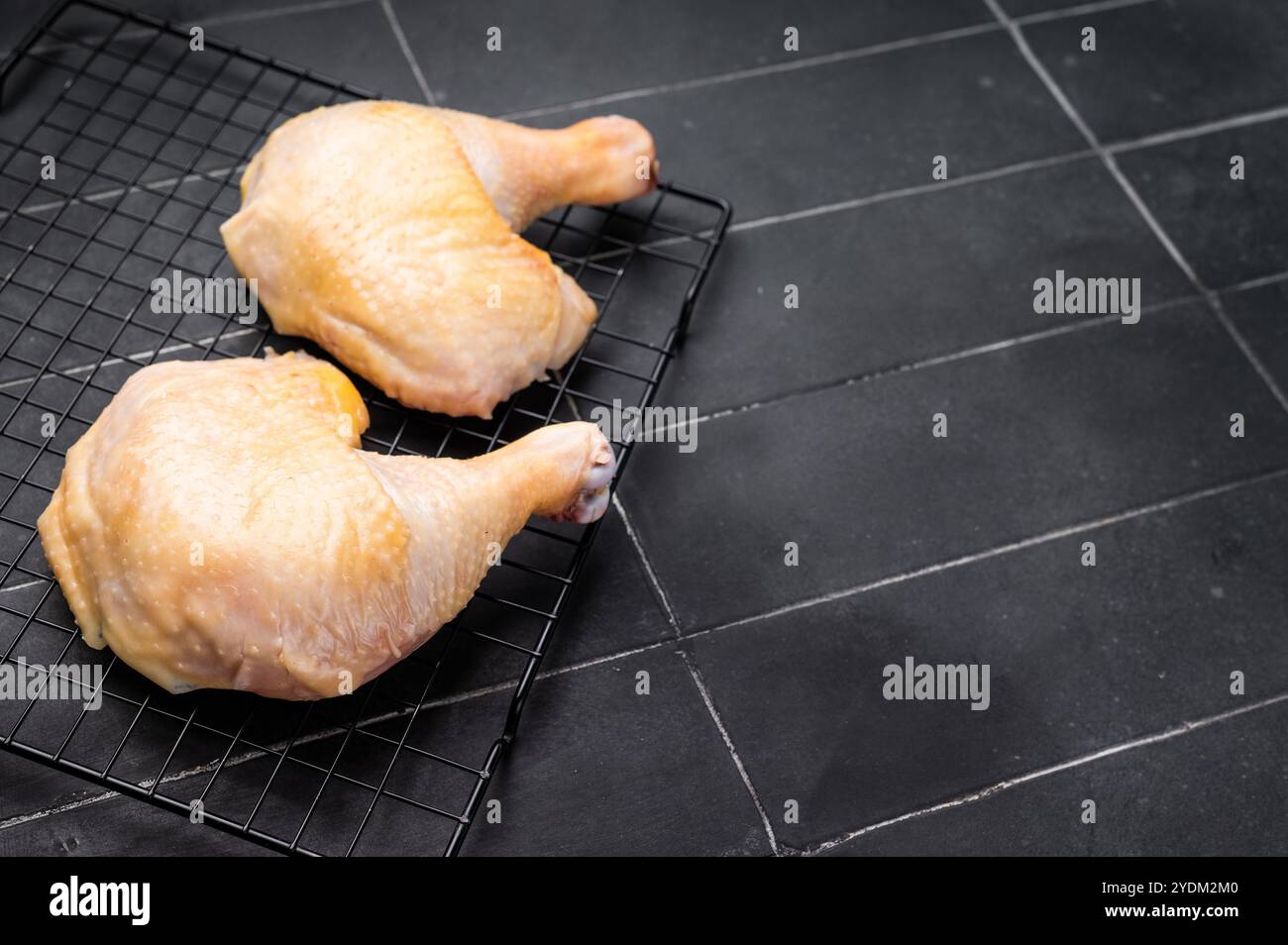 Fresh Raw farm chicken legs ready for cooking, poultry meat on black ...