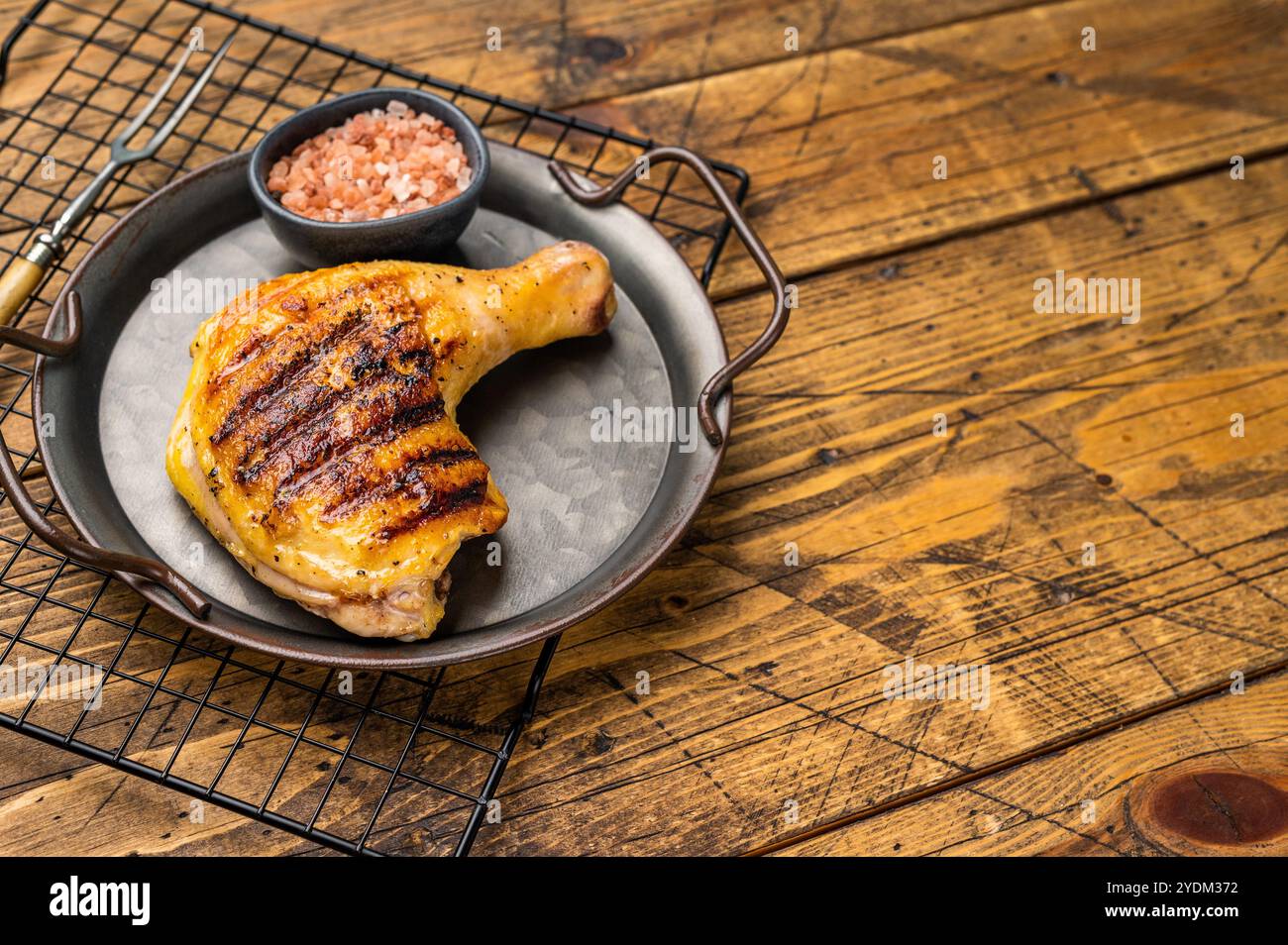 Grilled chicken leg with Thigh, roasted poultry meat on black ...