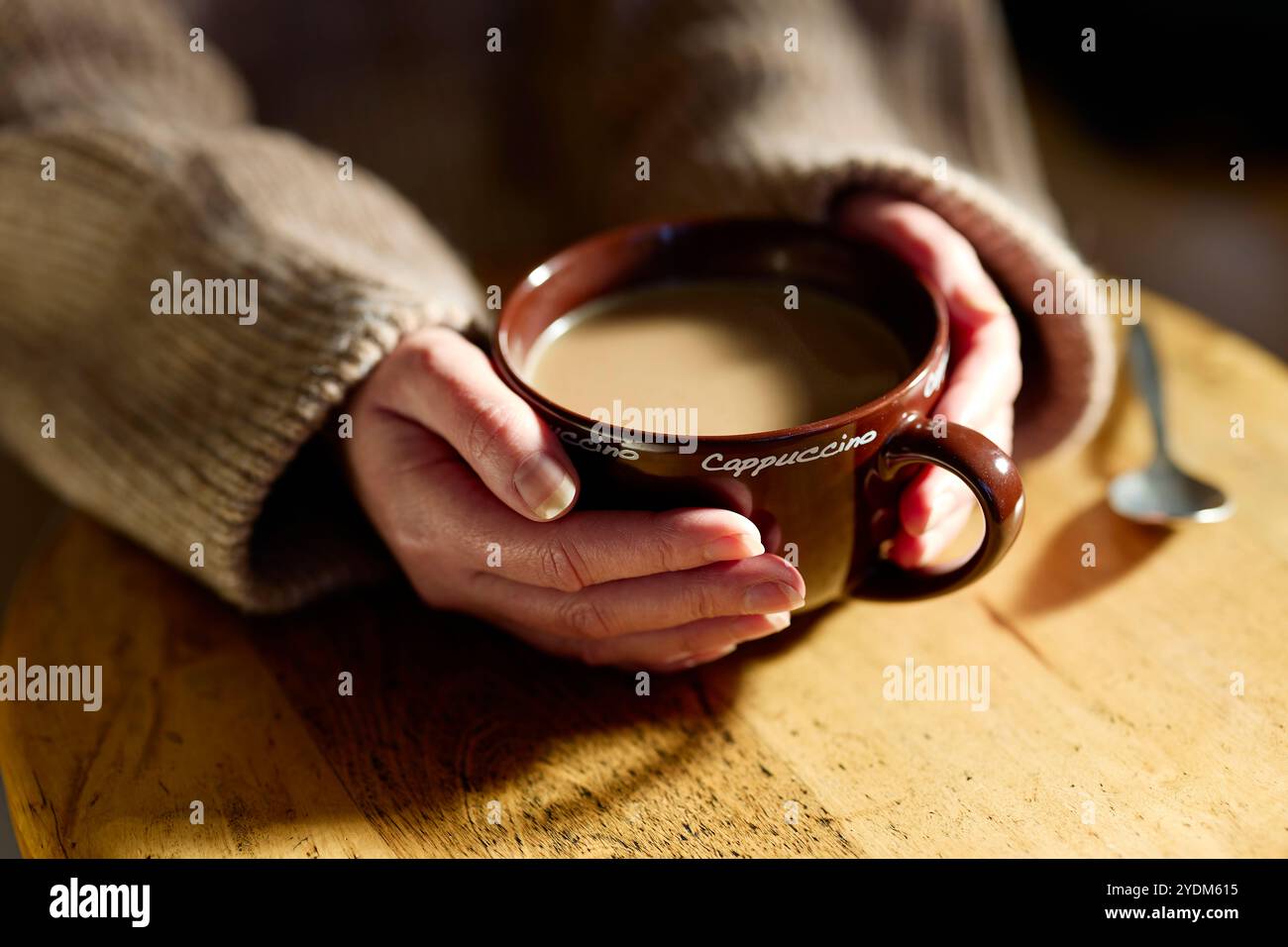 Cup coffee hand woman table hi-res stock photography and images - Alamy
