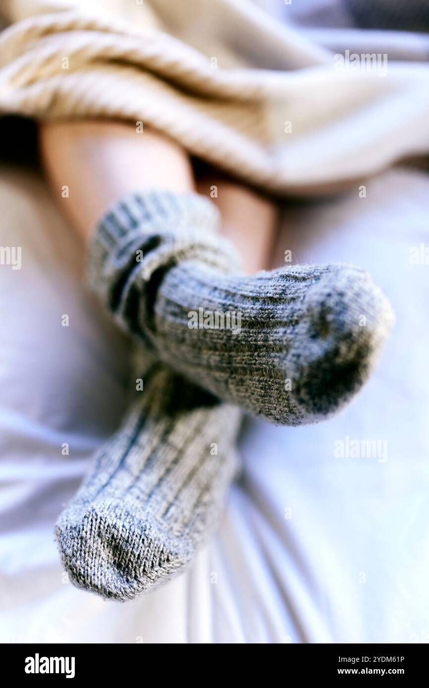 Woman's feet wearing socks Stock Photo - Alamy
