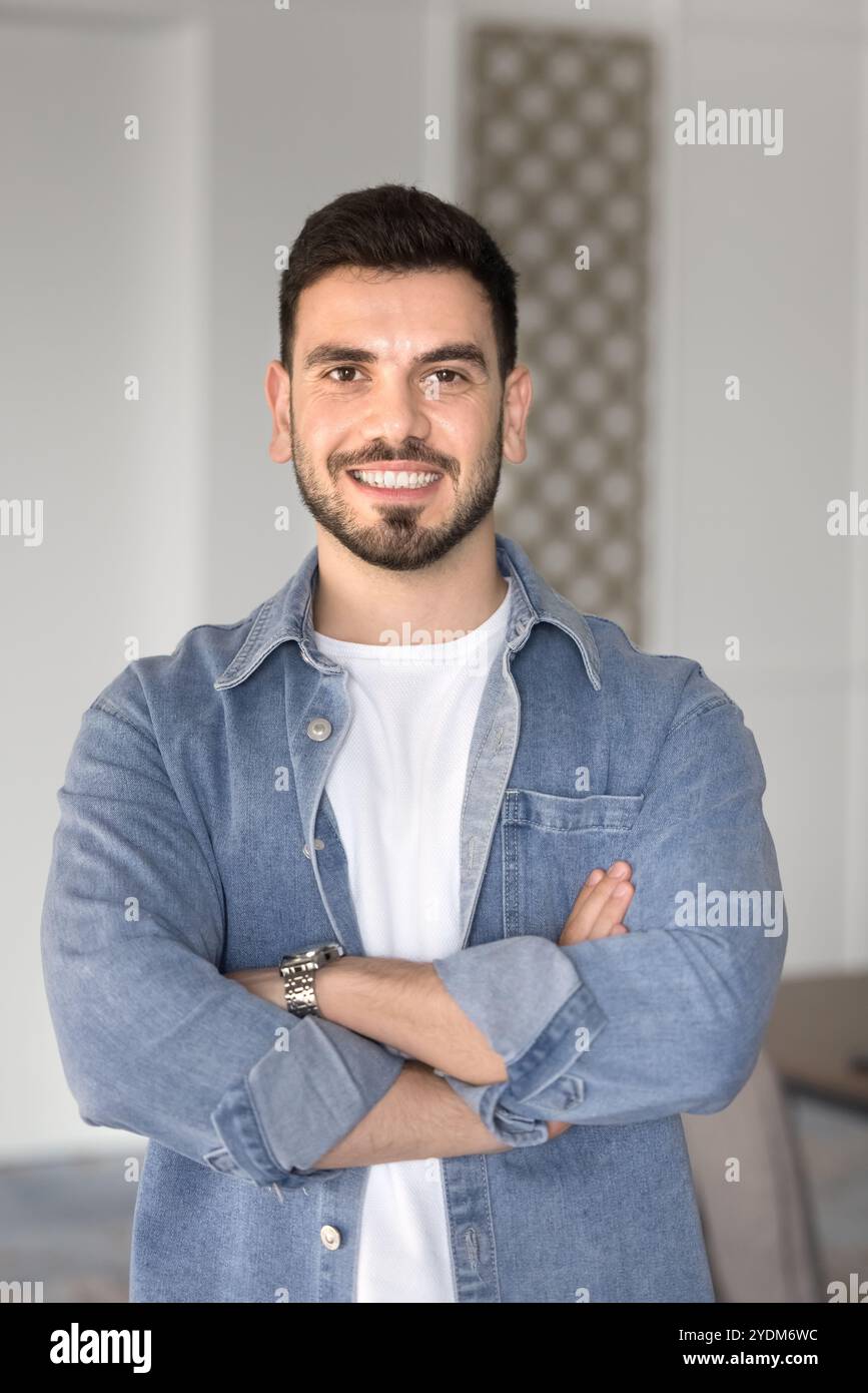 Happy confident Arabic business leader man posing with arms crossed ...