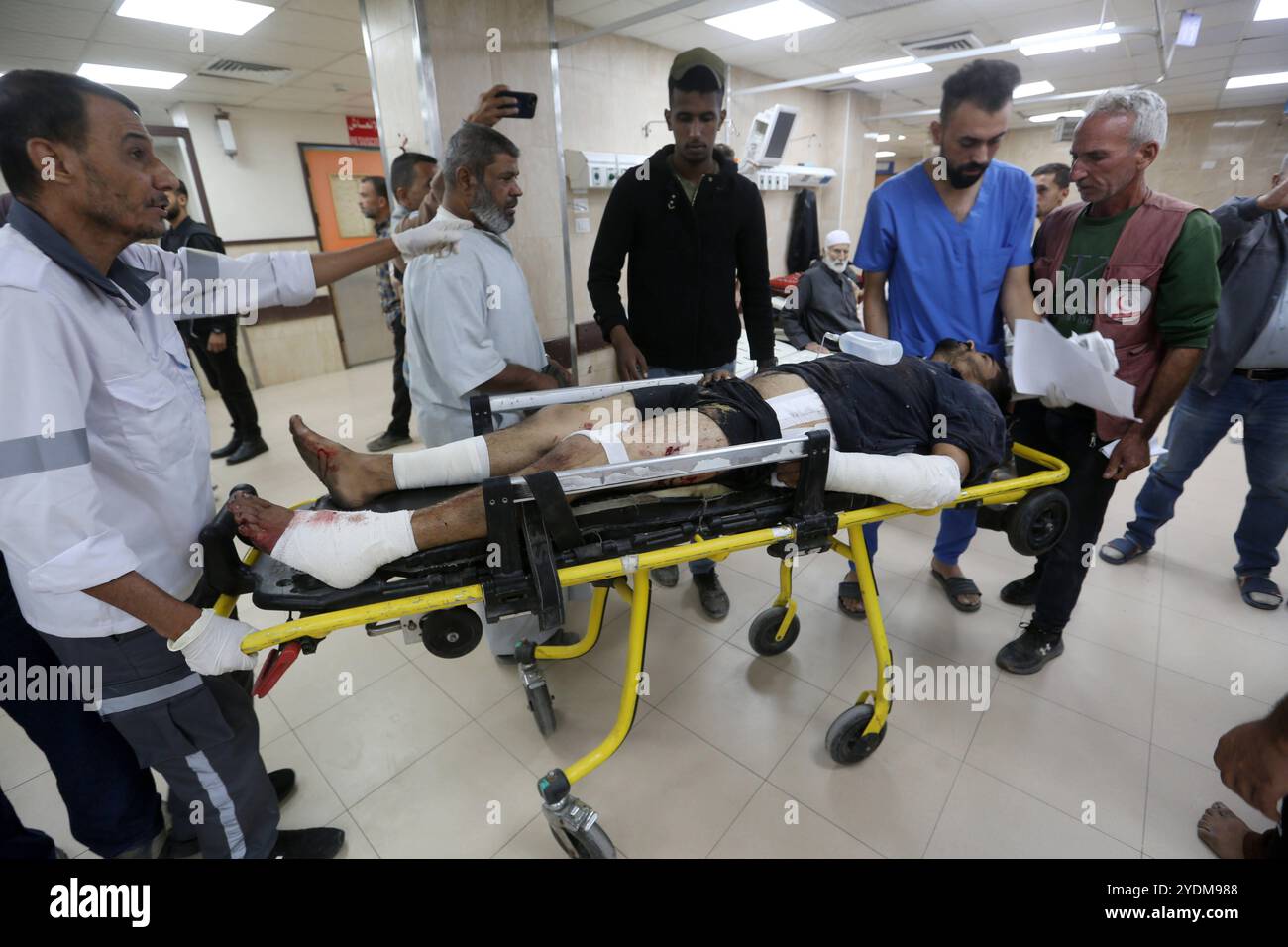 Wounded people, are brought to Al-Aqsa Martyrs Hospital for treatment ...