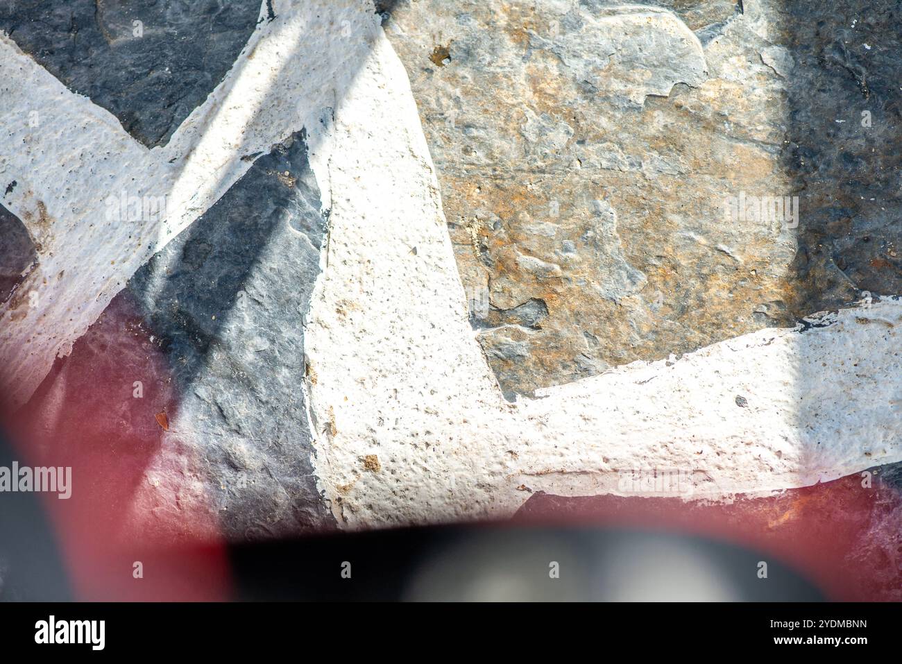 A detailed close-up of a natural stone texture background, showcasing ...