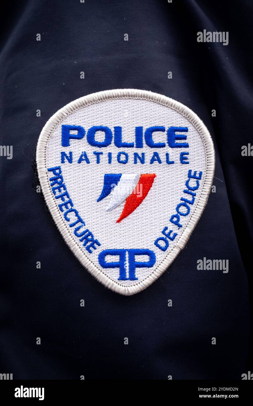 Police Nationale badge on the arm of a student police officer the ...