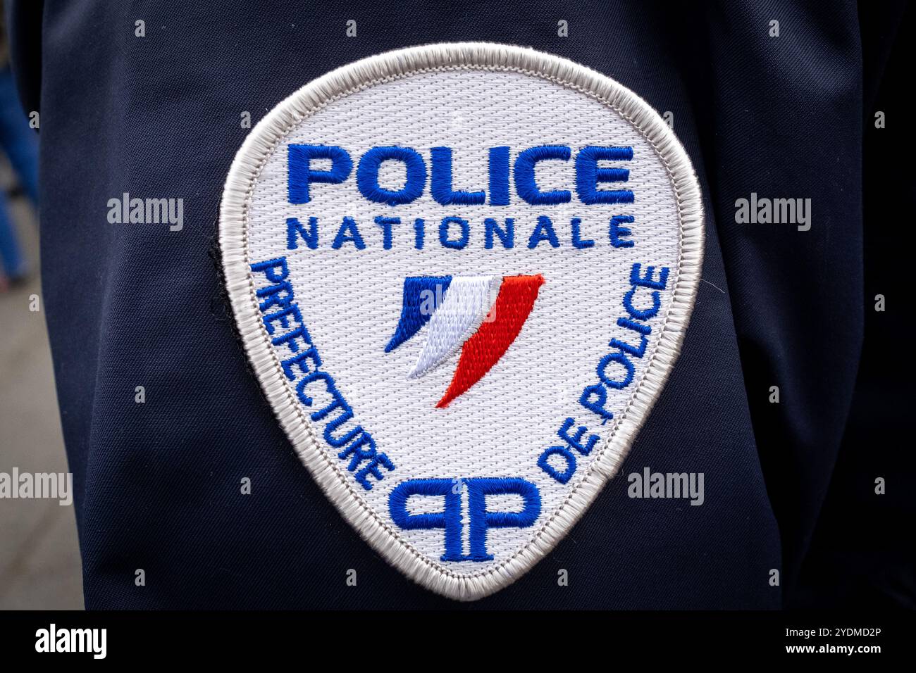 Police Nationale badge on the arm of a student police officer the ...