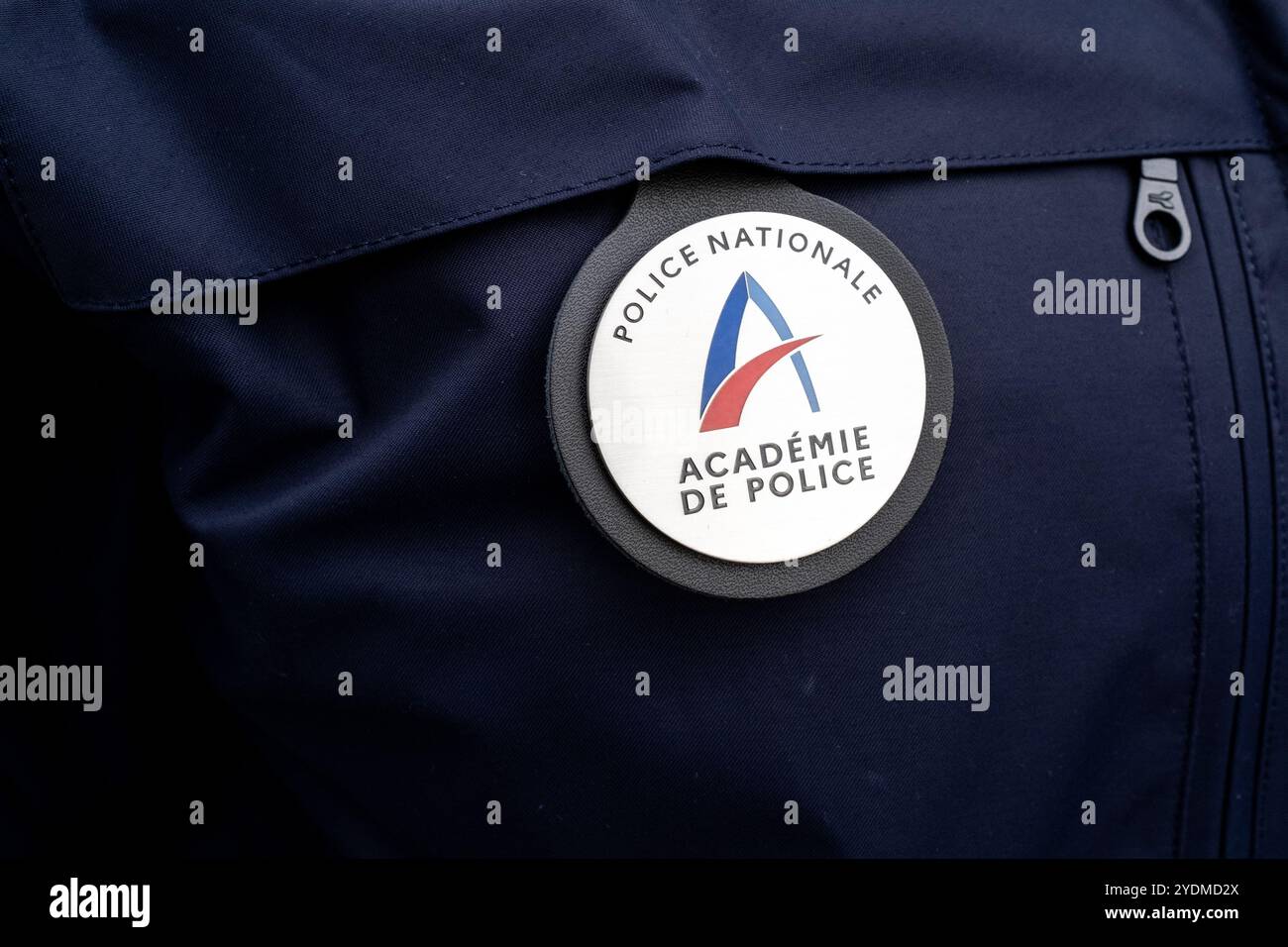 Academie de Police Nationale badge on the arm of a student police ...