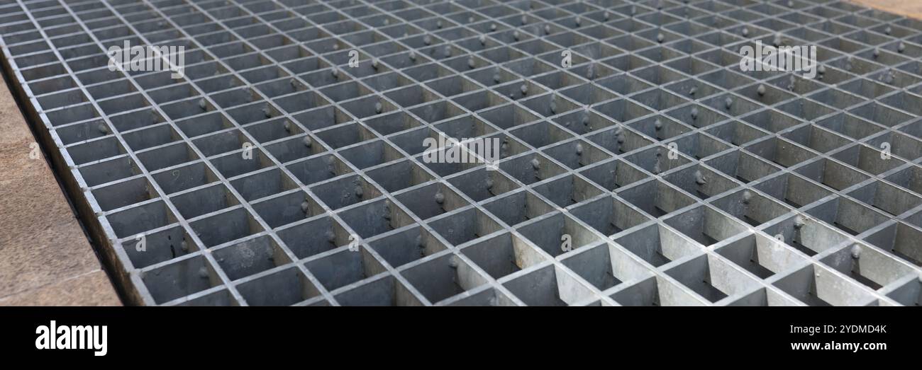 Metal bar grating over technical channel in marble floor Stock Photo ...