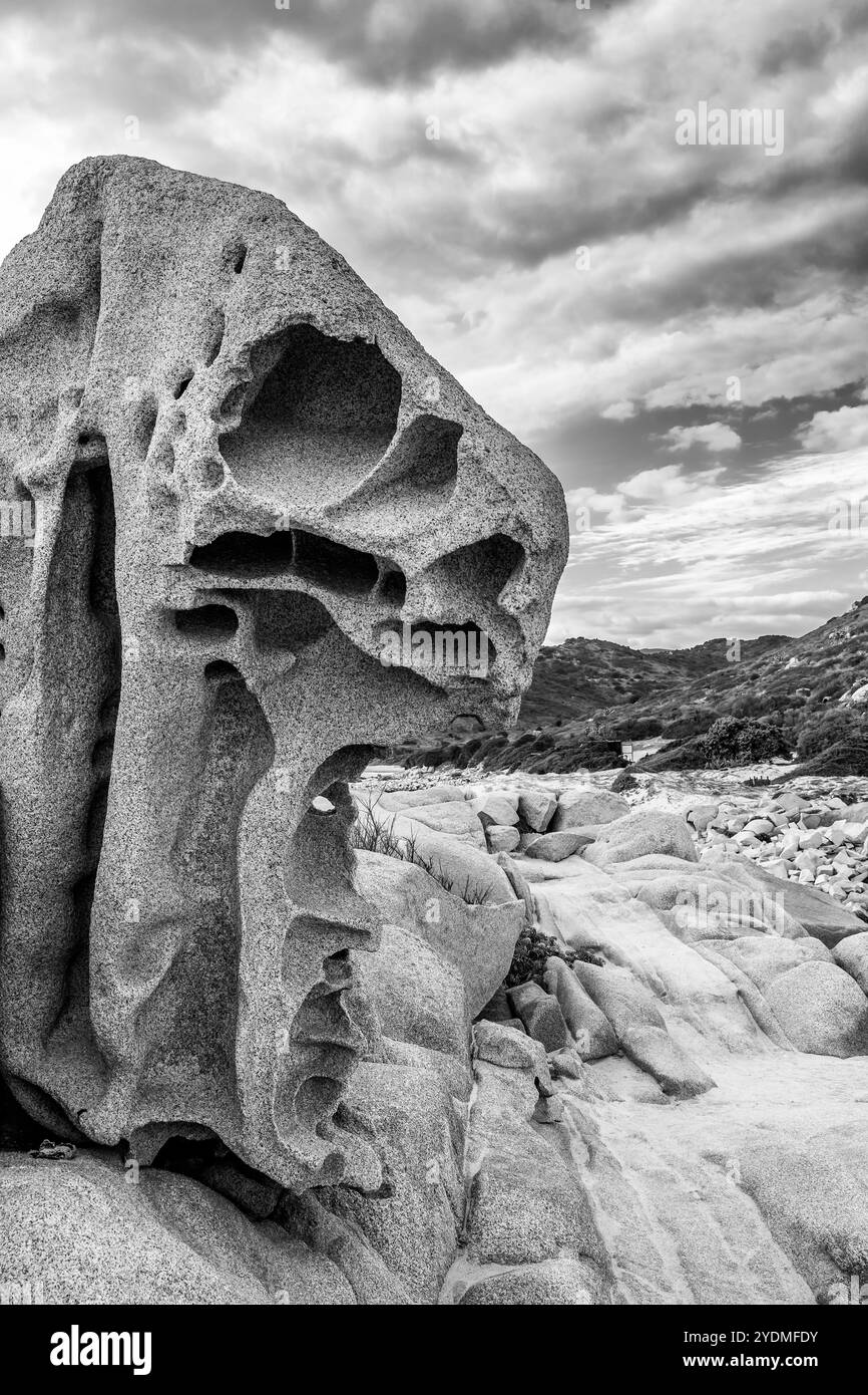 Large granite rocks sculpted by wind and weather, in black and white ...