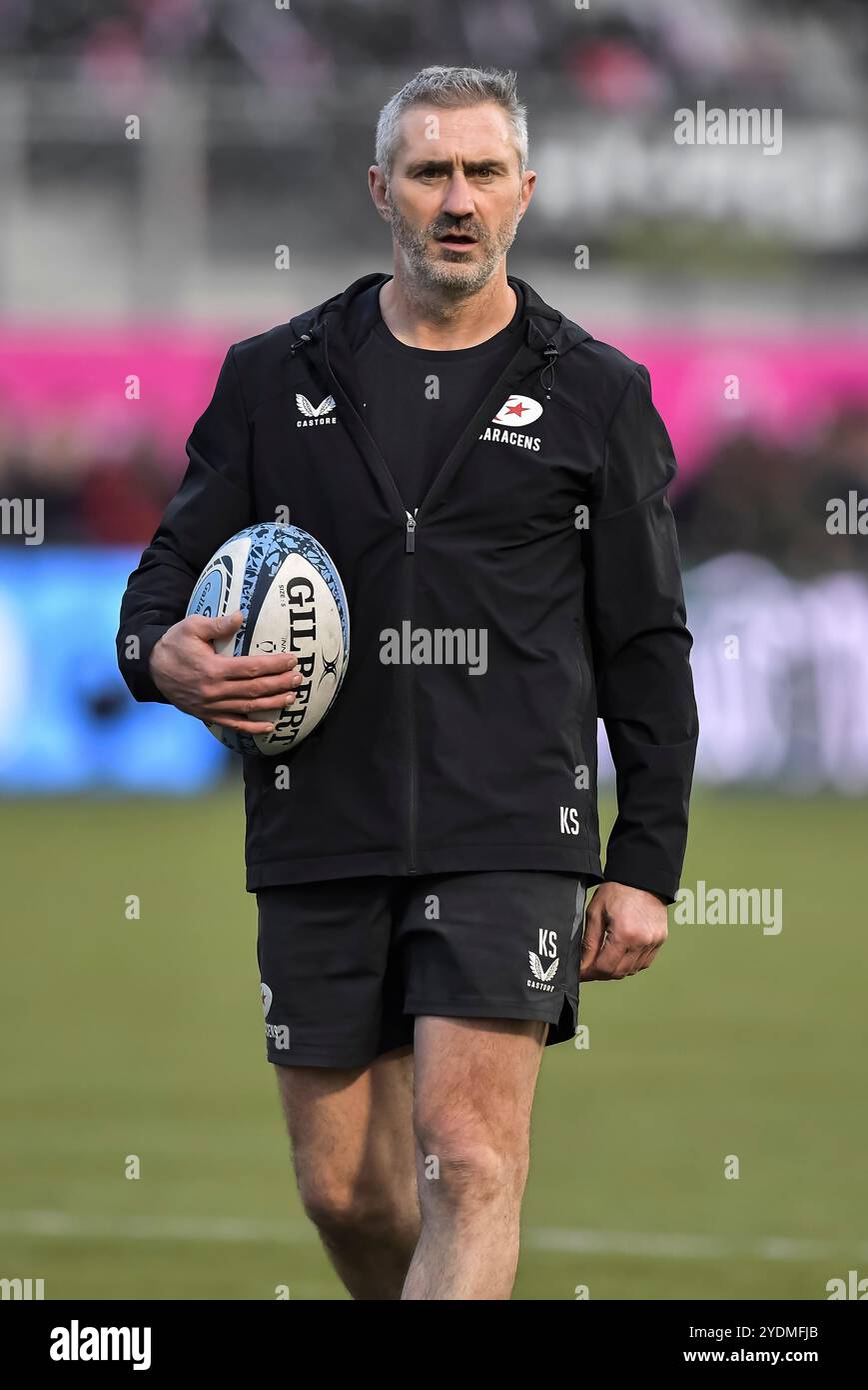 Kevin Sorrell men’s backs coach of Saracens warming up the team before ...