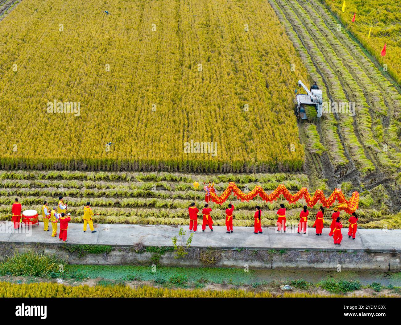 HUAI'AN, CHINA - OCTOBER 26, 2024 - Villagers beat gongs, drums and ...
