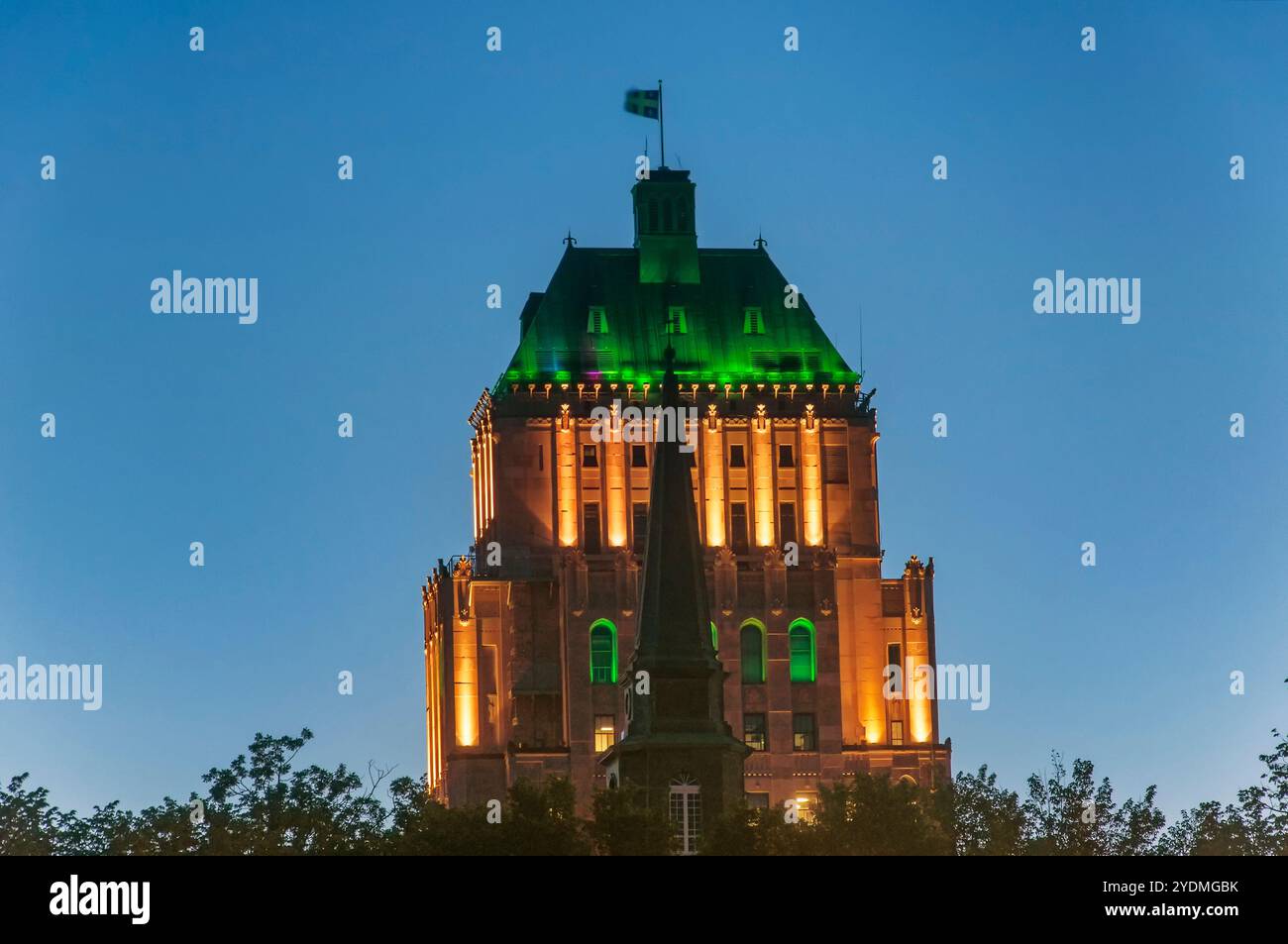 the landmark finance ministry building illuminated at night in Quebec ...