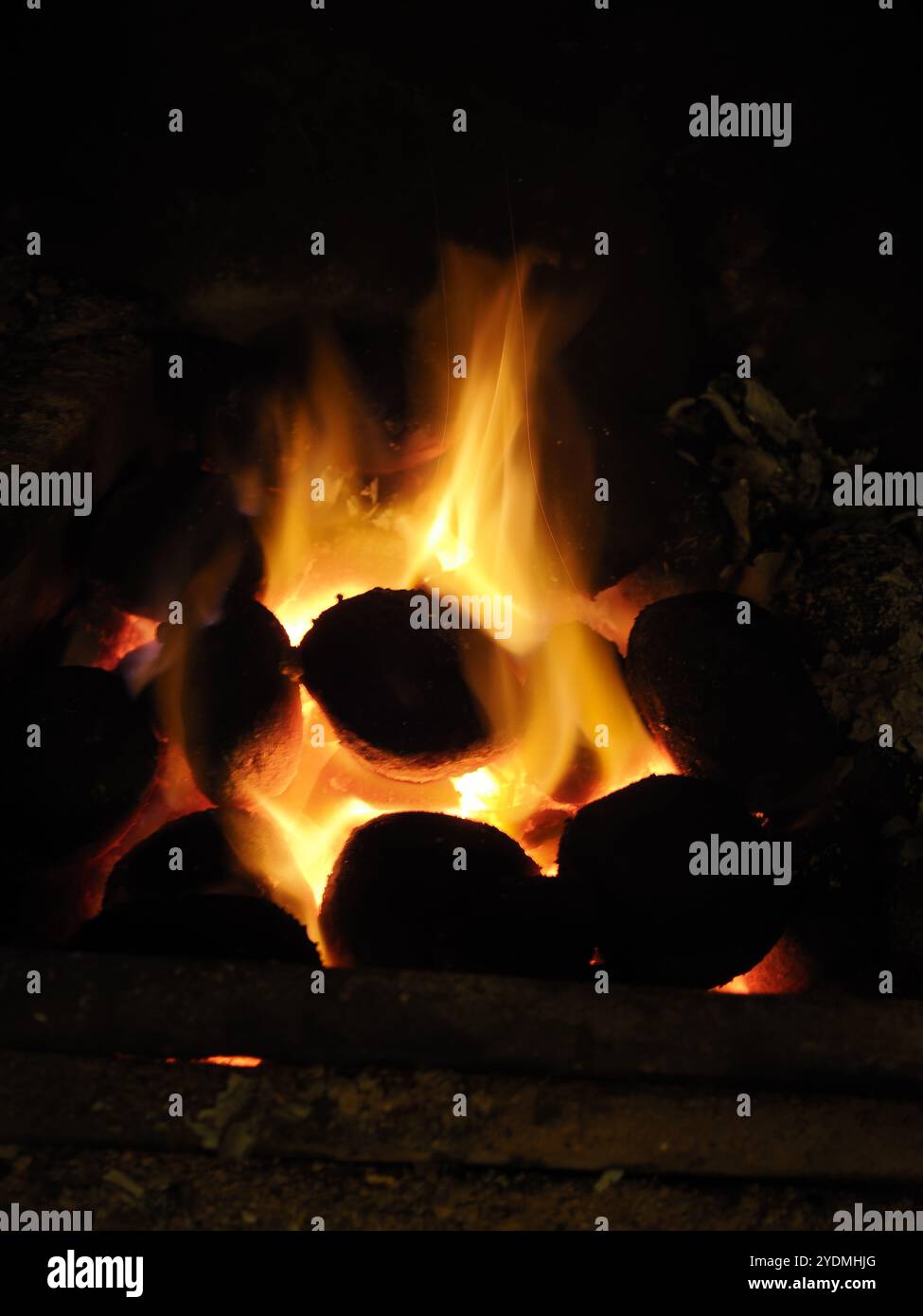 close-up of a blazing coal fire with orange flames Stock Photo - Alamy