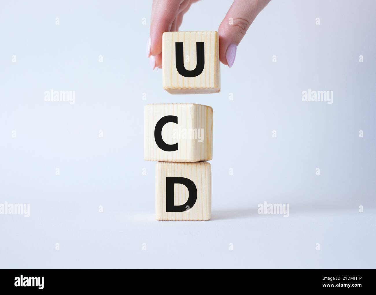 UCD - User Centered Design. Wooden cubes with word UCD. Businessman ... UCD - User Centered Design. Wooden cubes with word UCD. Businessman ...