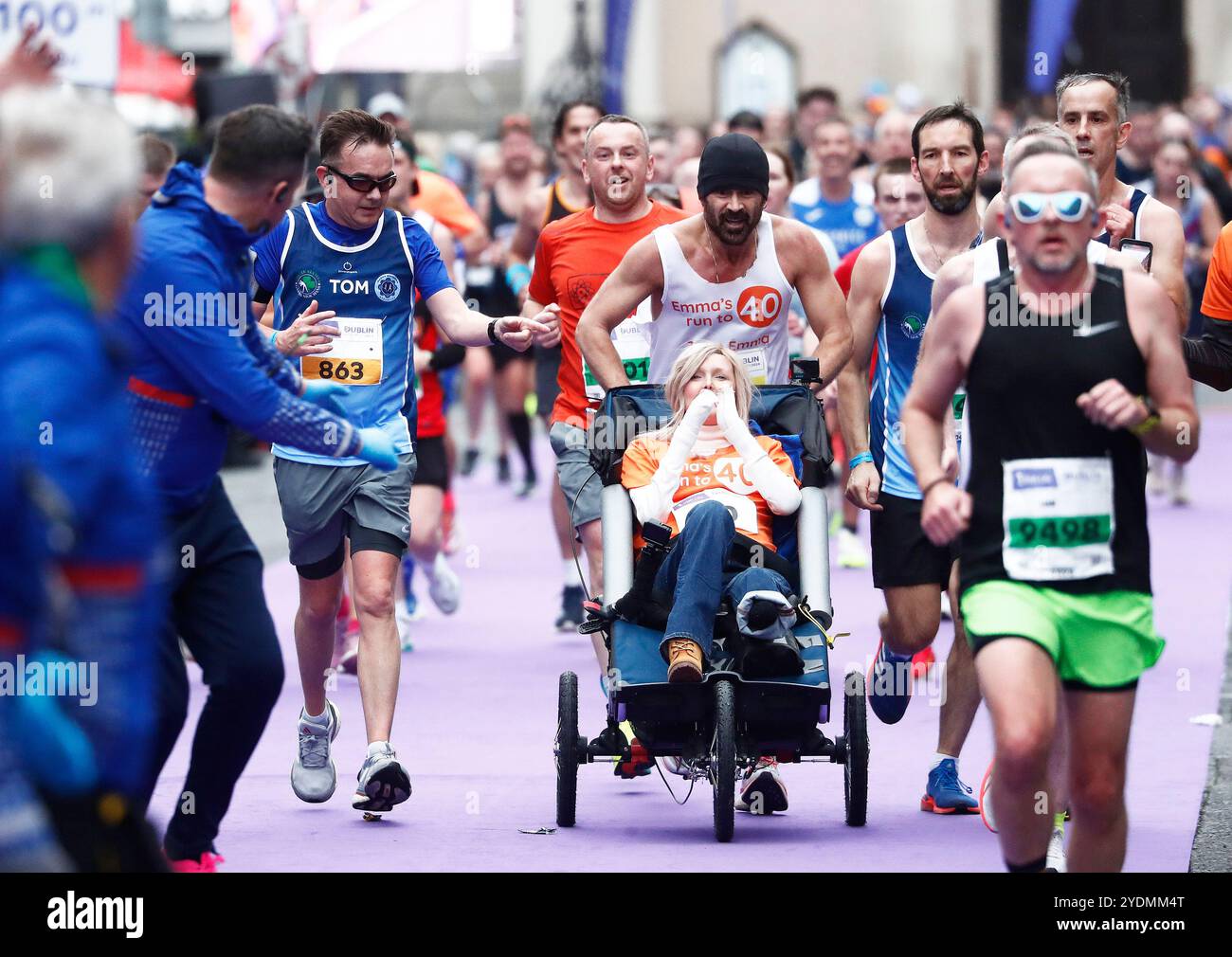Actor Colin Farrell running with close friend Emma Fogarty who is the ...