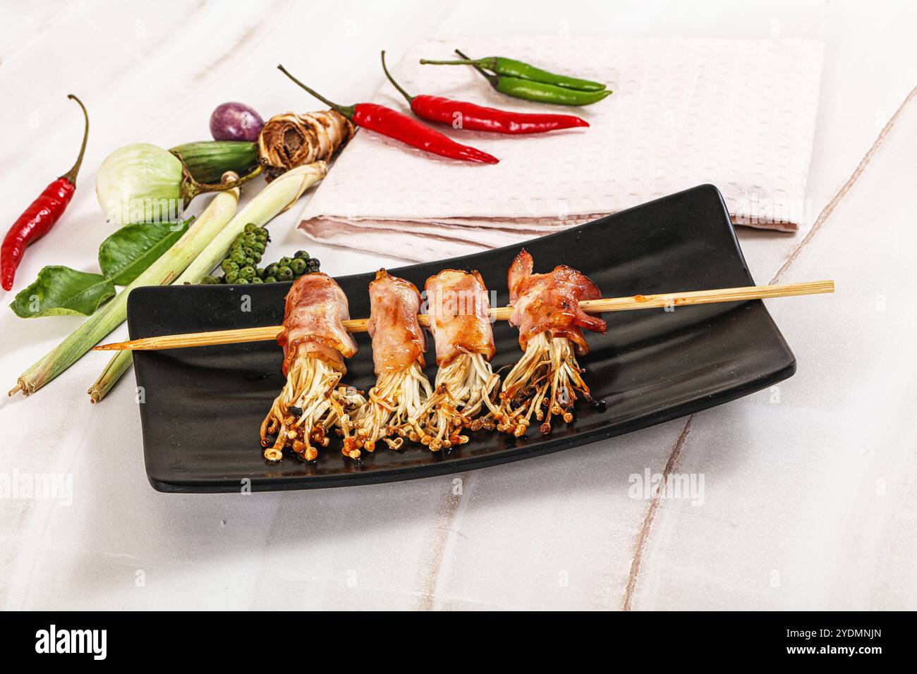 Thai Street foof satay with bacon and mushroom enoki skewer Stock Photo ...