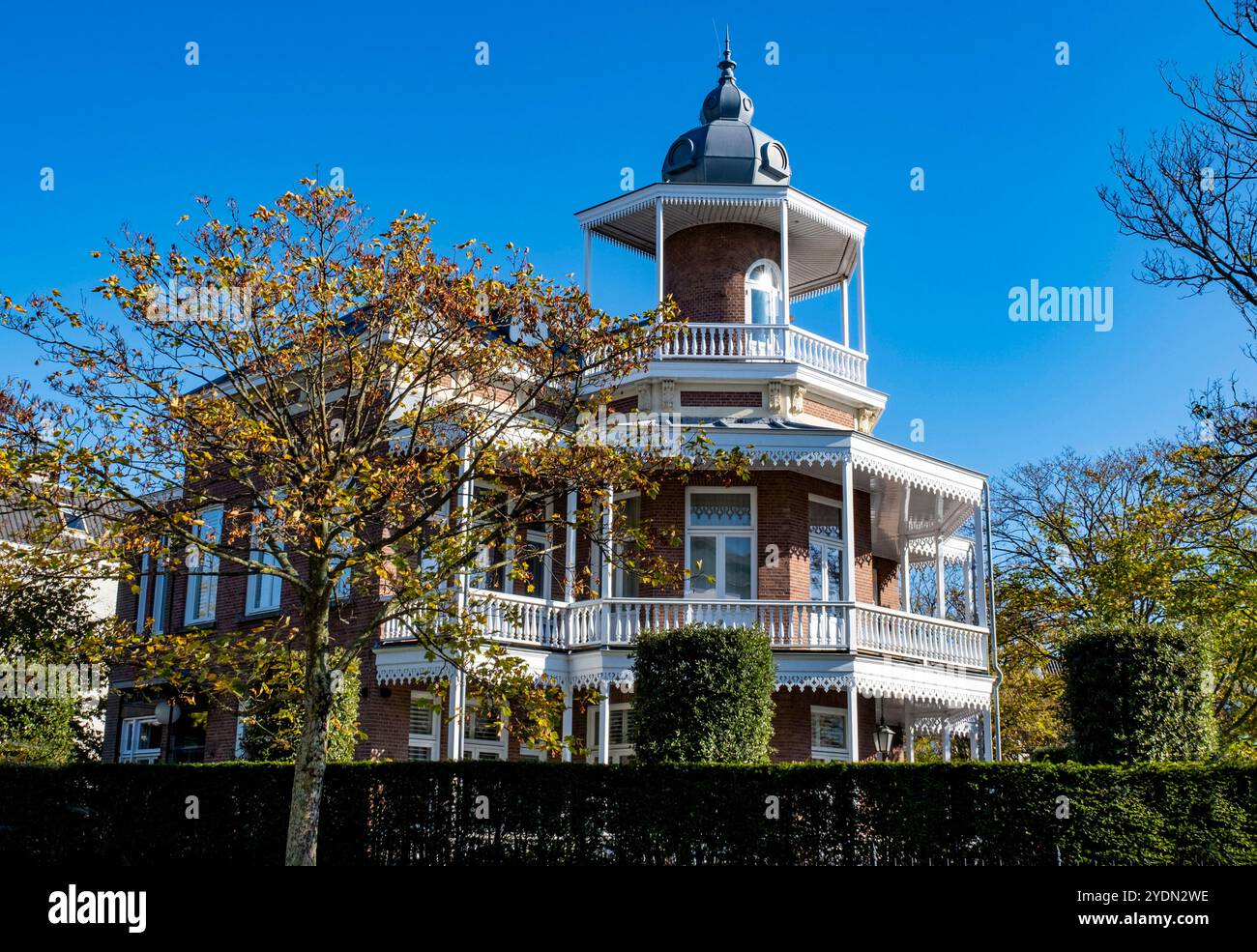 Typical Dutch cityscape on the sunny day with streets, a calm canal ...