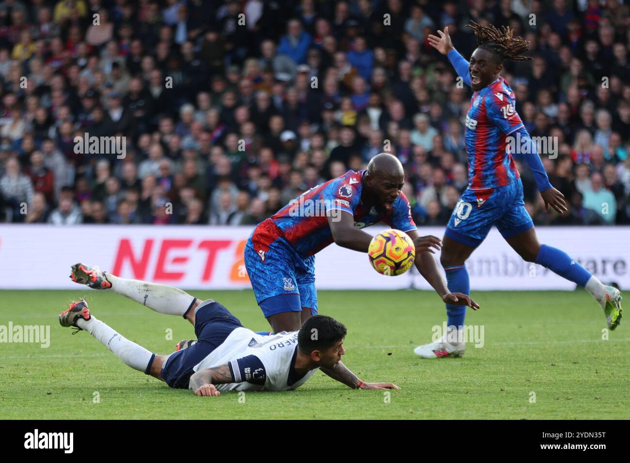Tottenham Hotspur's Cristian Romero (left) and Crystal Palace's Jean ...