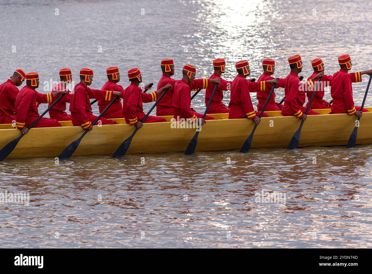 Bangkok, Thailand. 27th Oct, 2024. Rowers paddle ornate barges down the ...