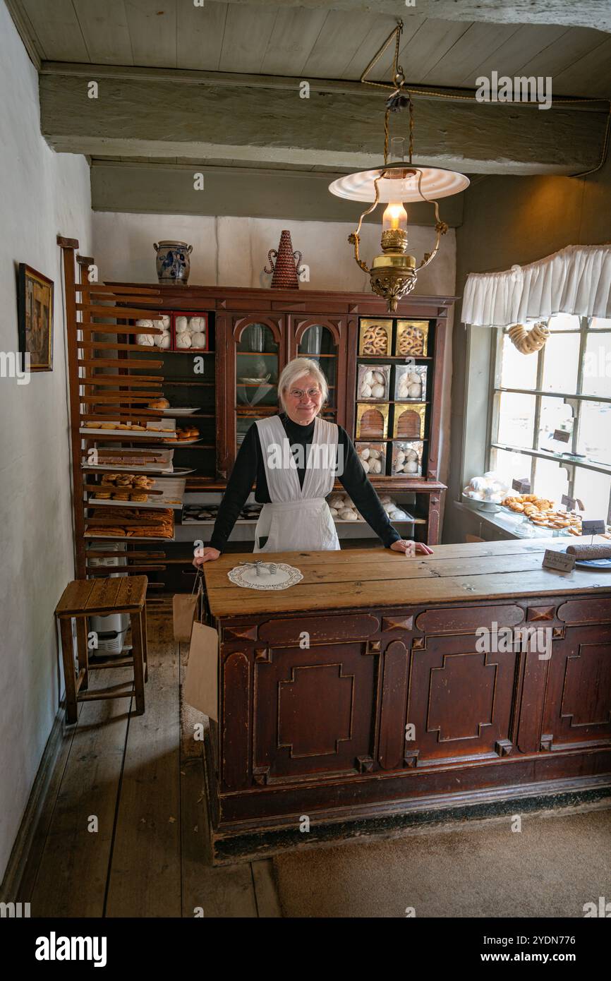 Historic Bakery Scene with Baker in Vintage Shop Interior Stock Photo ...