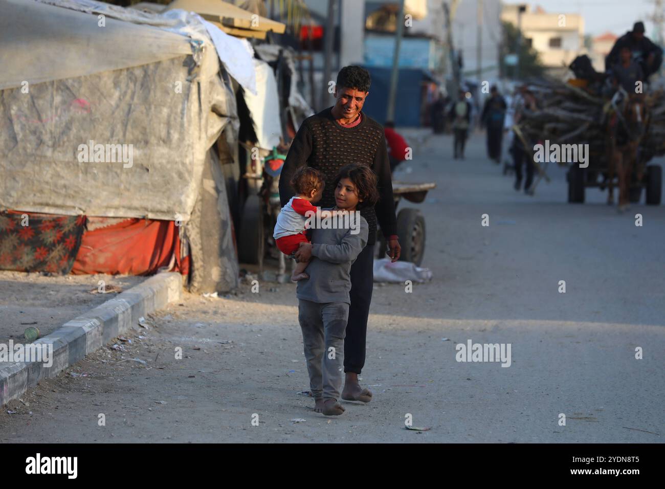 Displaced Palestinian children are seen at a temporary shelter in the ...