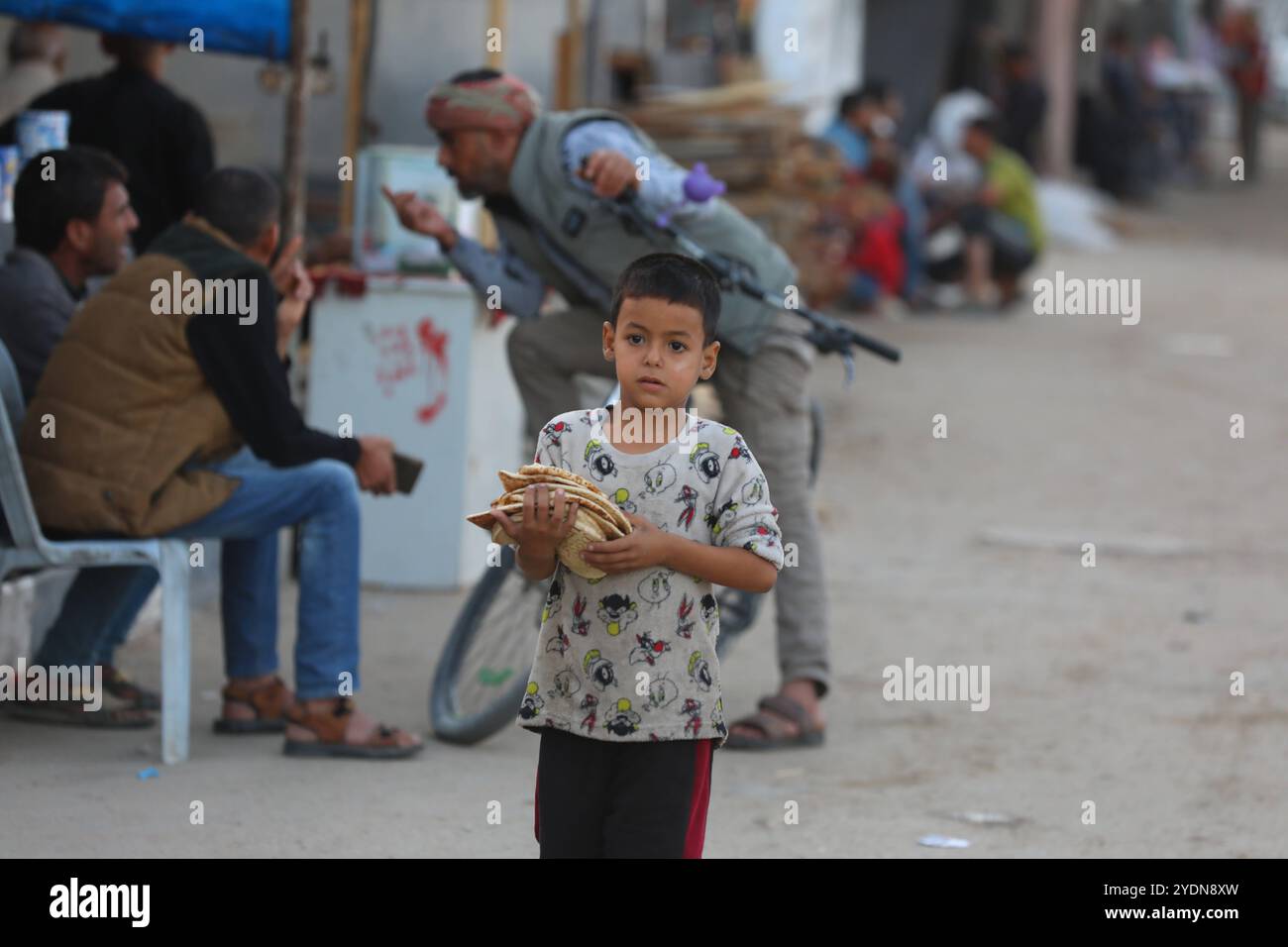 Displaced Palestinian children are seen at a temporary shelter in the ...