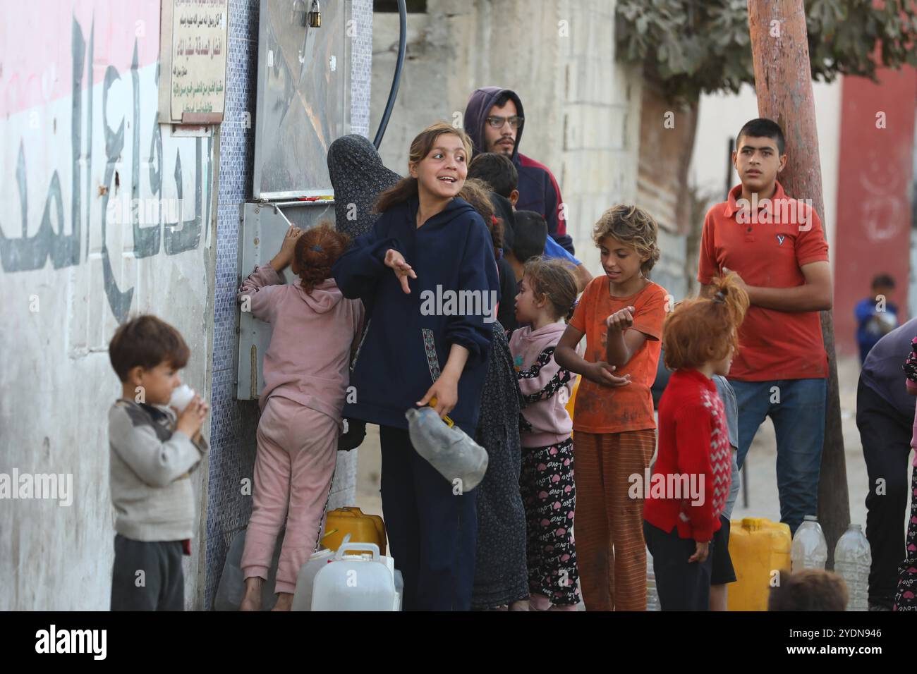 Displaced Palestinian children are seen at a temporary shelter in the ...