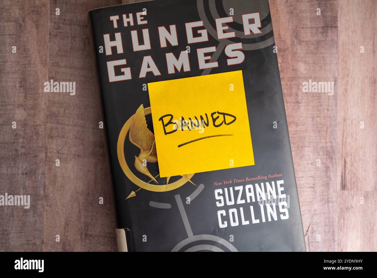 A copy of the Suzanne Collins bestseller The Hunger Games. The book has ...