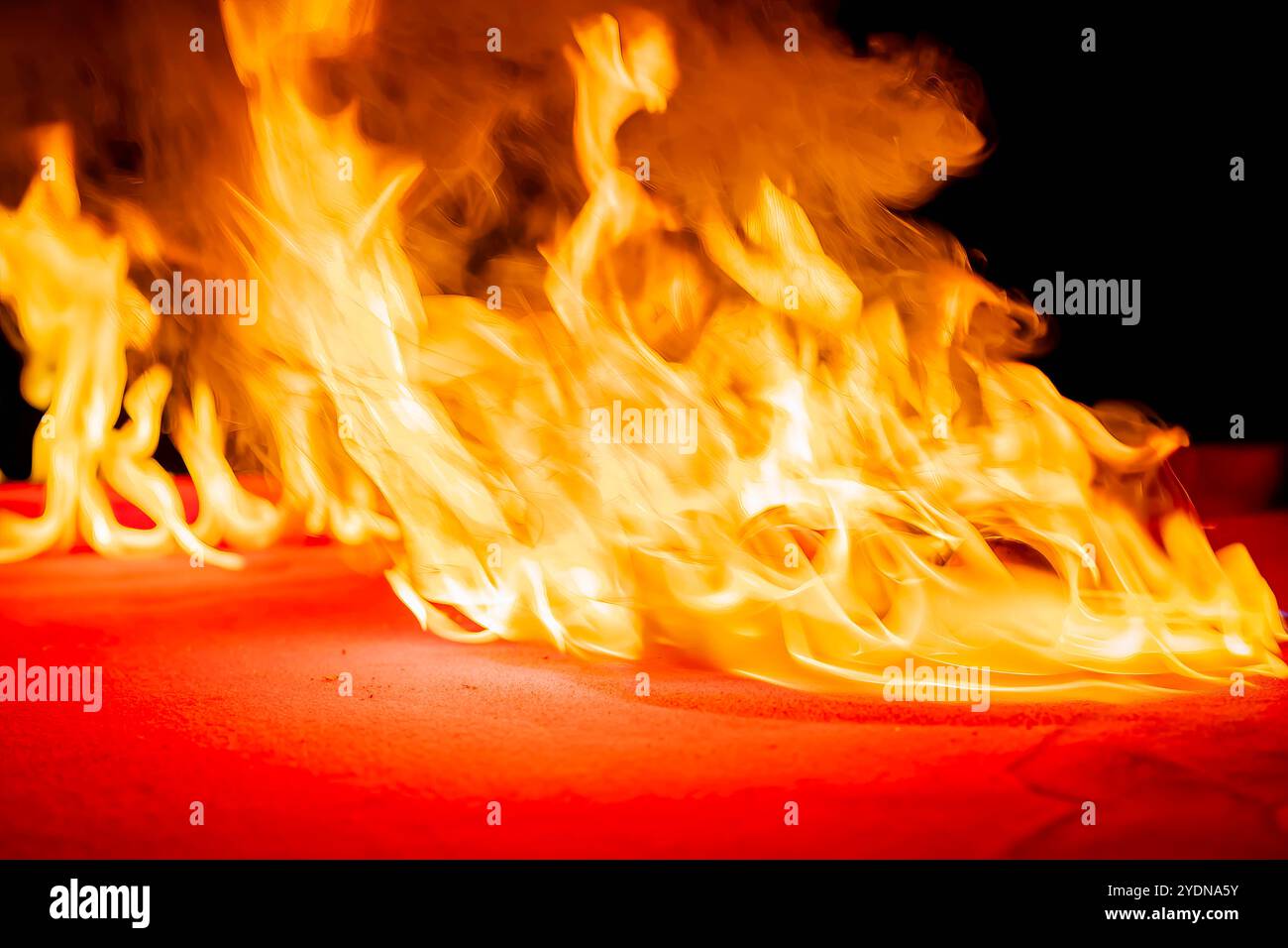 A billiard table is engulfed in flames, with blazing balls scattering ...