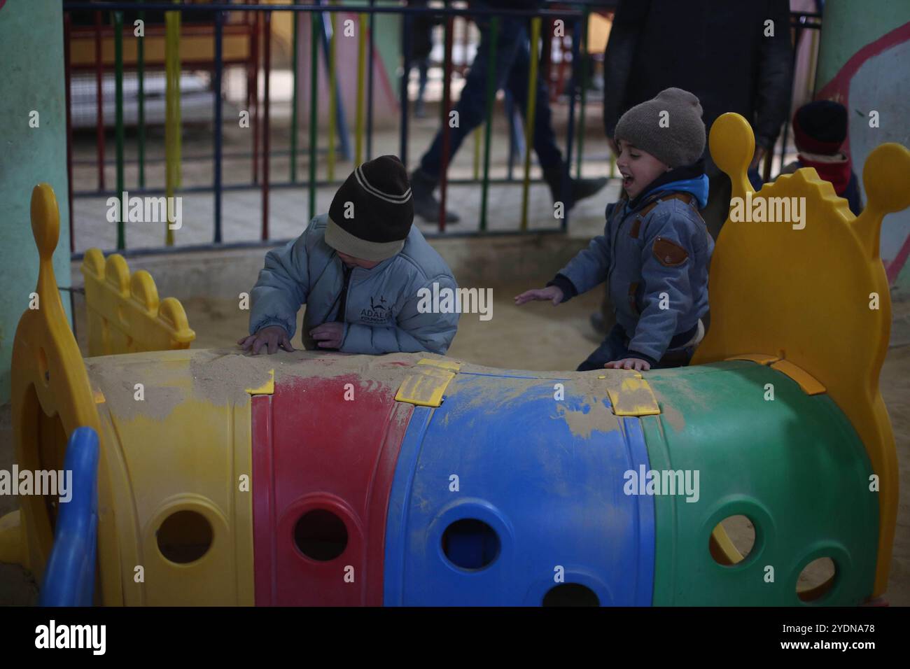 Orphan Syrian children in a playground build underground to protect ...