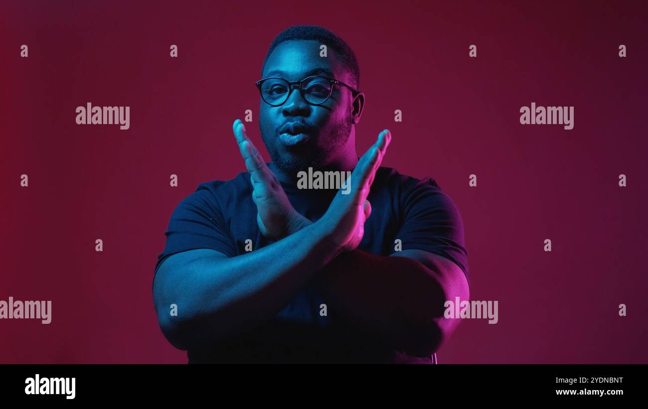 Rejection gesture. Decline offer. Serious man with crossed hands ...