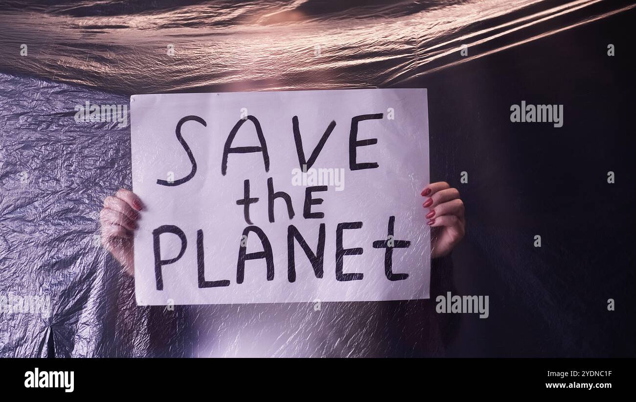 Save planet. Environmental strike. Defocused activist woman silhouette ...
