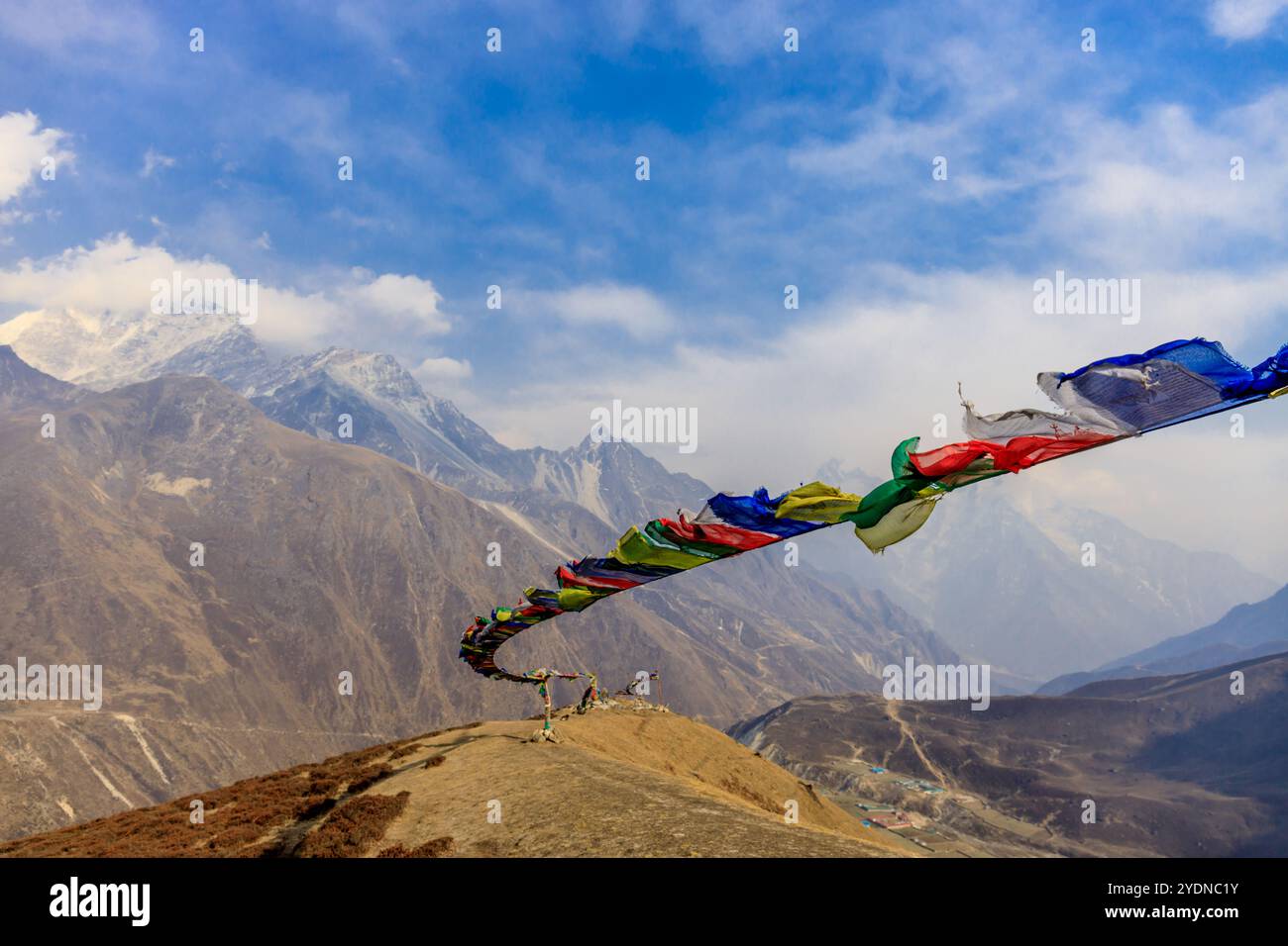 Colorful prayer flags with mantra written on it in the Himalayas ...