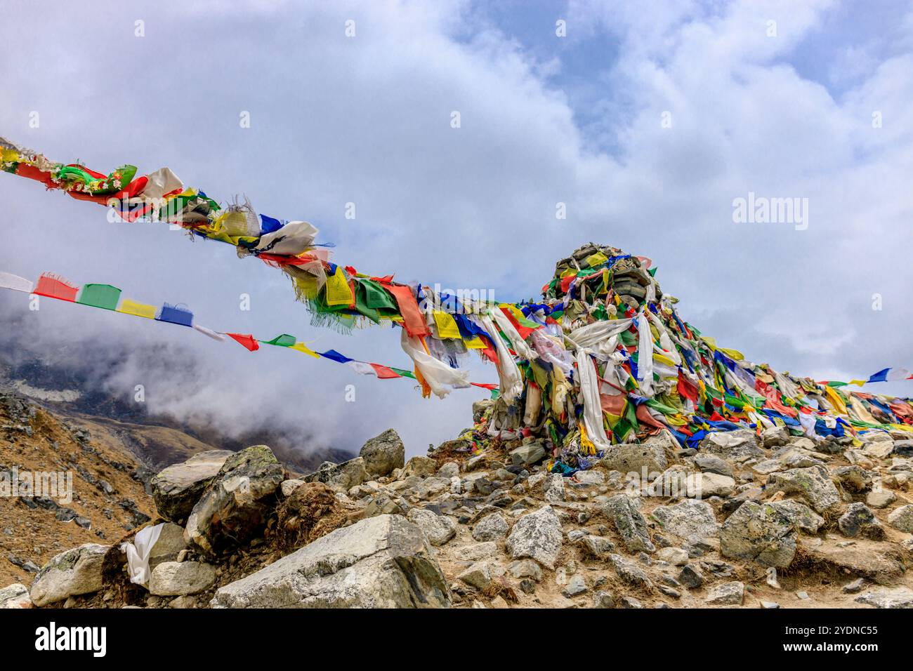 Colorful prayer flags with mantra written on it in the Himalayas ...