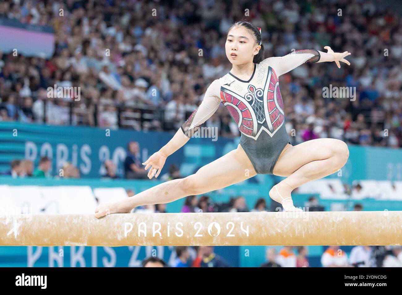 August 01, 2024: Rina Kishi of Japan performs on beam in the Women's ...