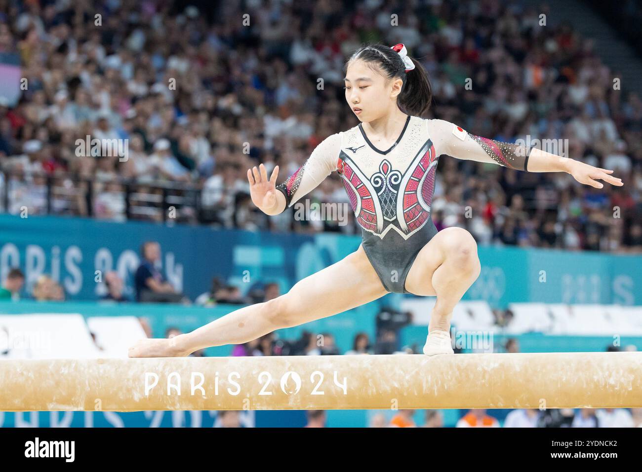 August 01, 2024: Rina Kishi of Japan performs on beam in the Women's ...