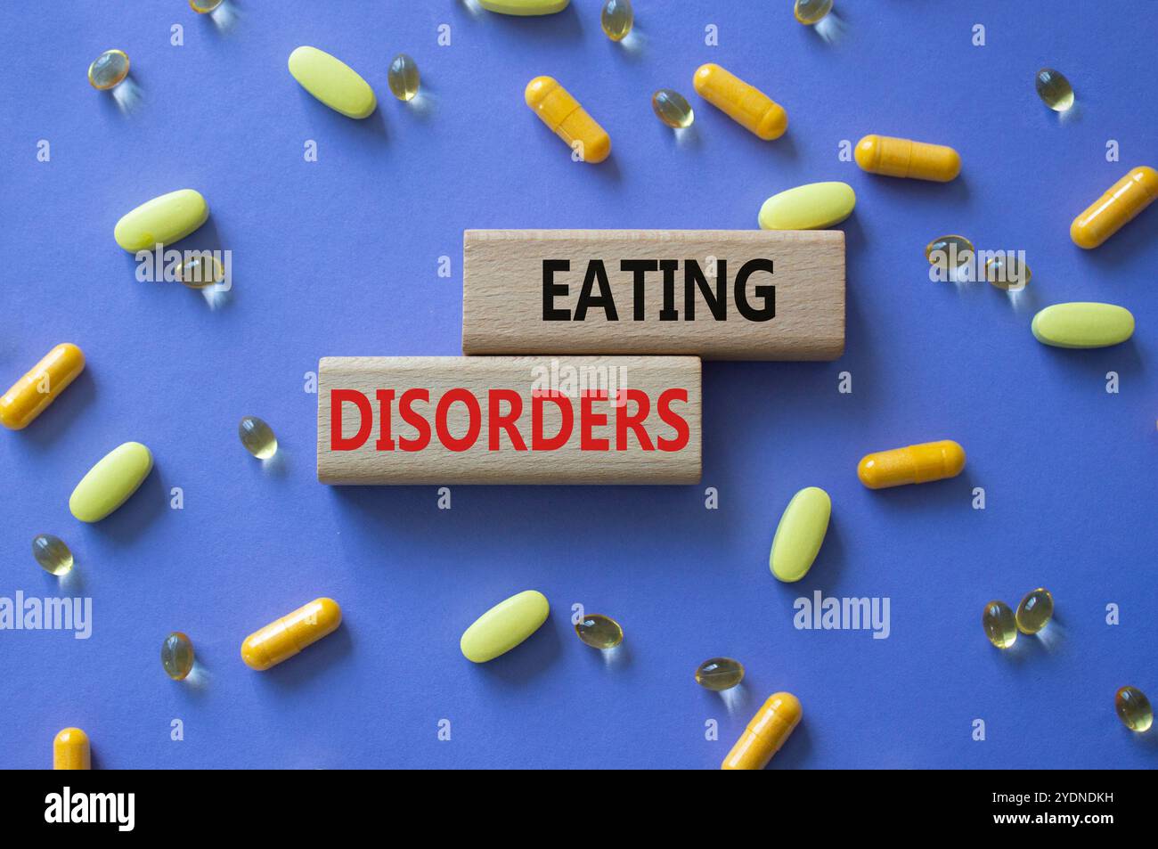 Eating Disorders symbol. Concept word. Eating Disorders on wooden ...