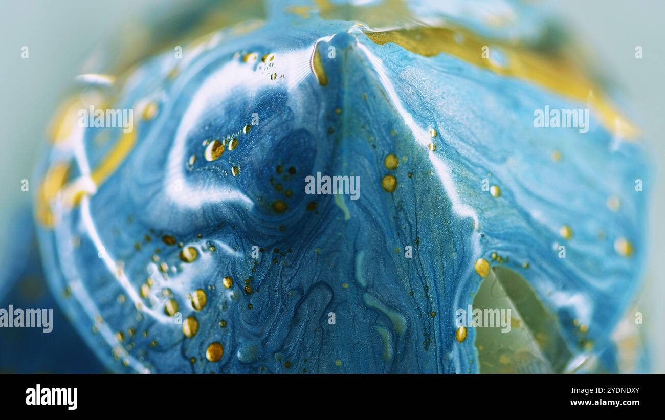 Glitter fluid drip. Paint crystal. Blur blue golden yellow color ...