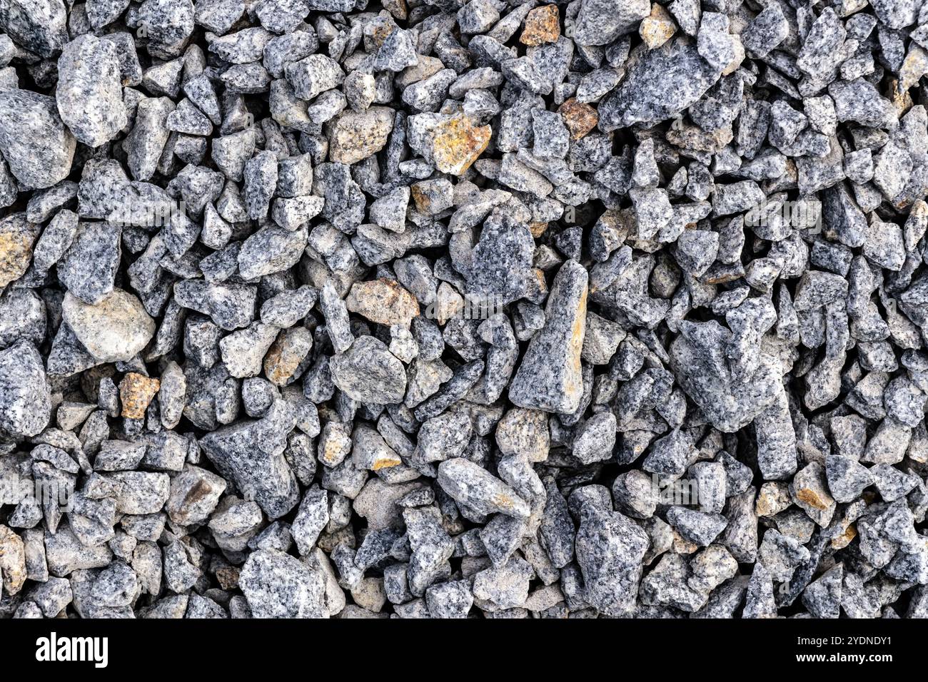 Close-up of crushed grey stone on the ground texture background. Mound ...