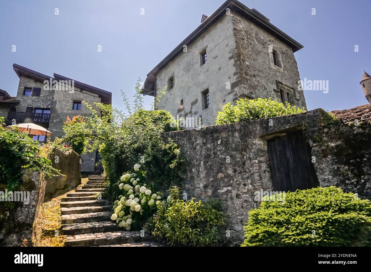 Medieval stone buildings dating from the 14th century along the French ...