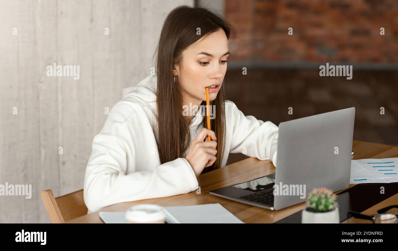Freelance millennial girl works hi-res stock photography and images - Alamy